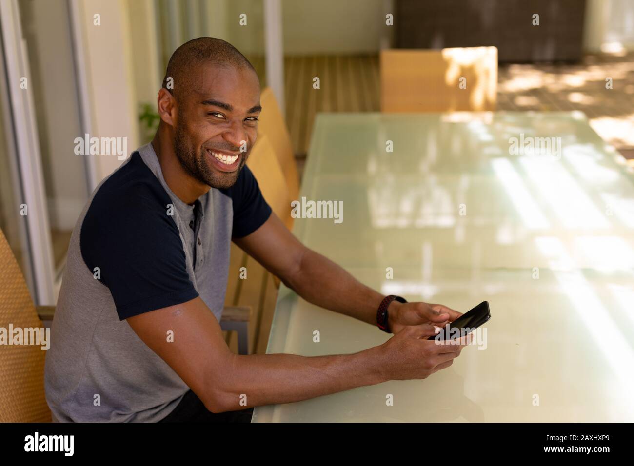 Adult man home terrace using hi-res stock photography and images - Alamy