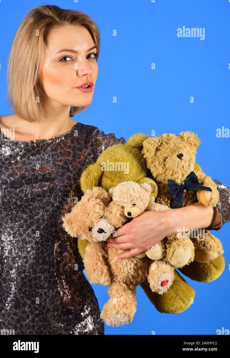 Tenderness and beauty concept. Girl with seductive face plays with ...