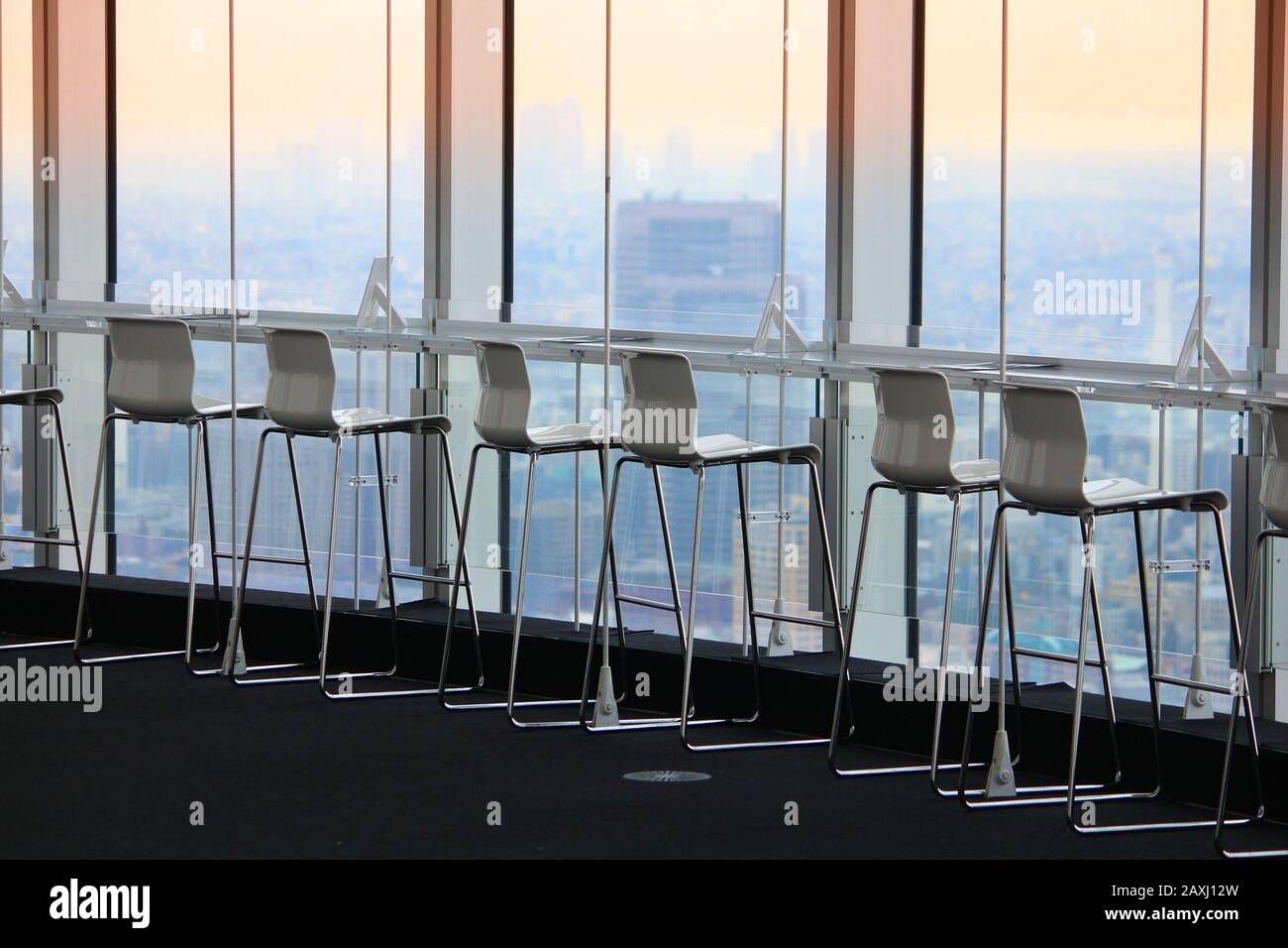 TOKYO, JAPAN - DECEMBER 1, 2016: Bar and lounge empty chairs on 52nd ...