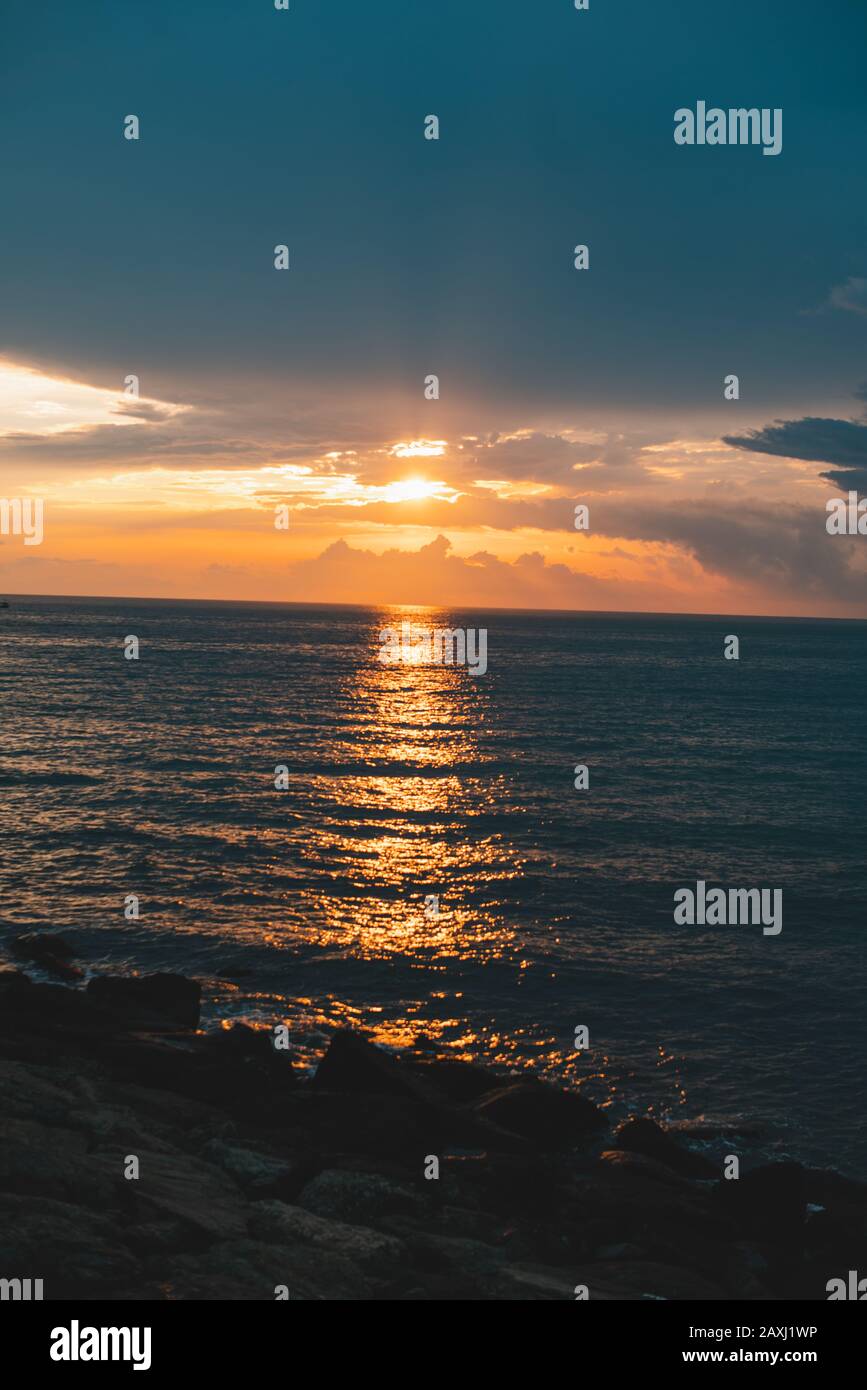 Sea horizon line and sunset photo. Landscape concept Stock Photo - Alamy