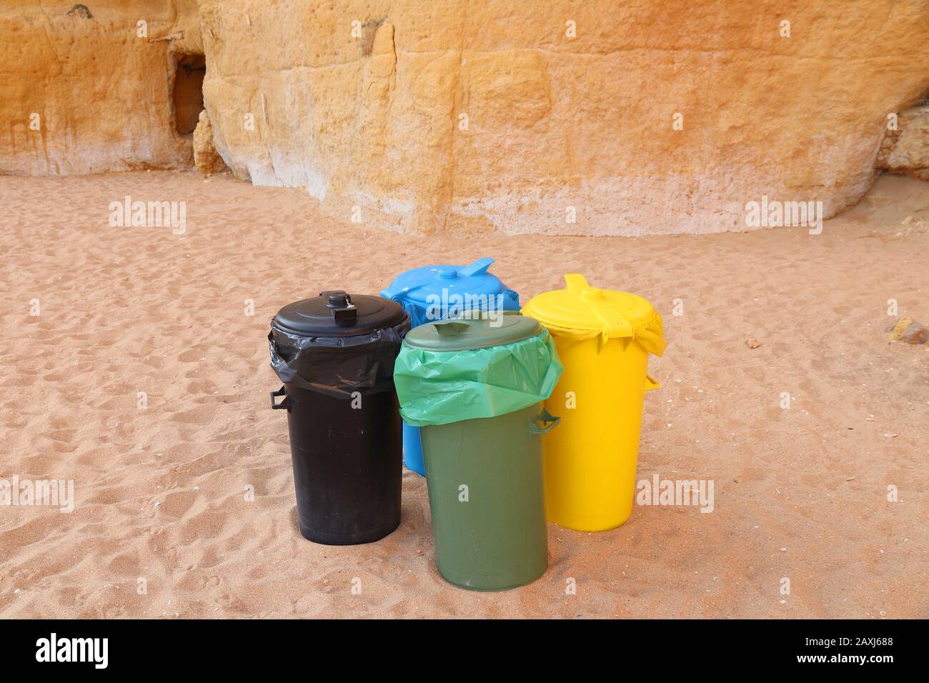 Clean beach. Waste sorting containers at a public beach in Algarve ...