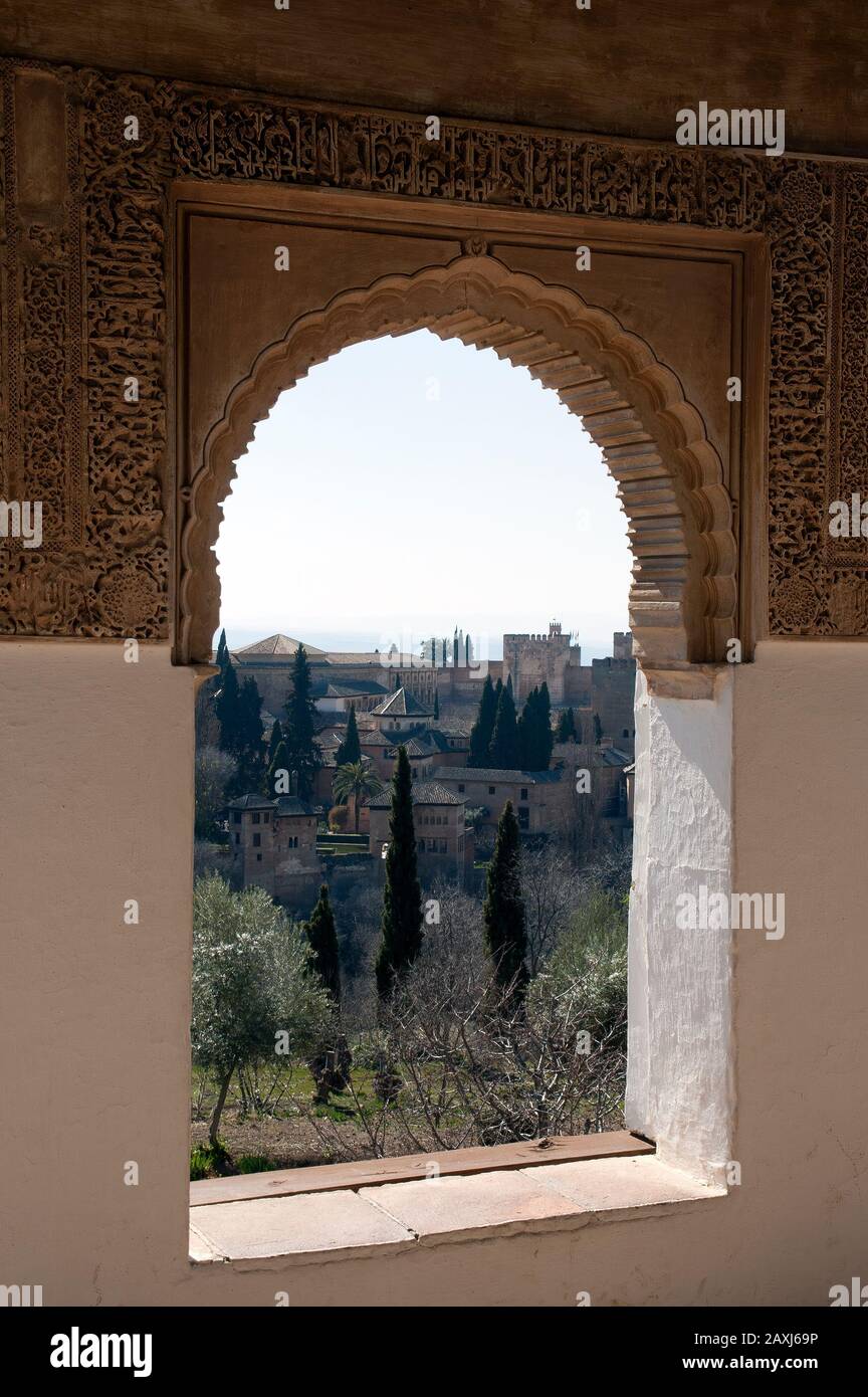 Granada Spain, view through arch window with Islamic or Arabic ...