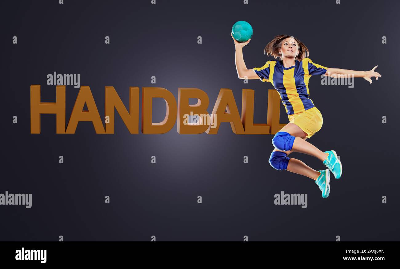 female handball player with a ball in action Stock Photo - Alamy