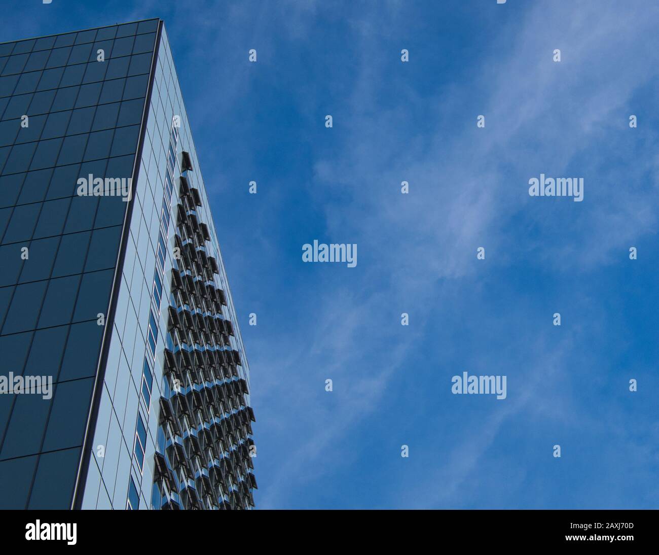 A view from below to the upper floors from a high-rise building Stock ...