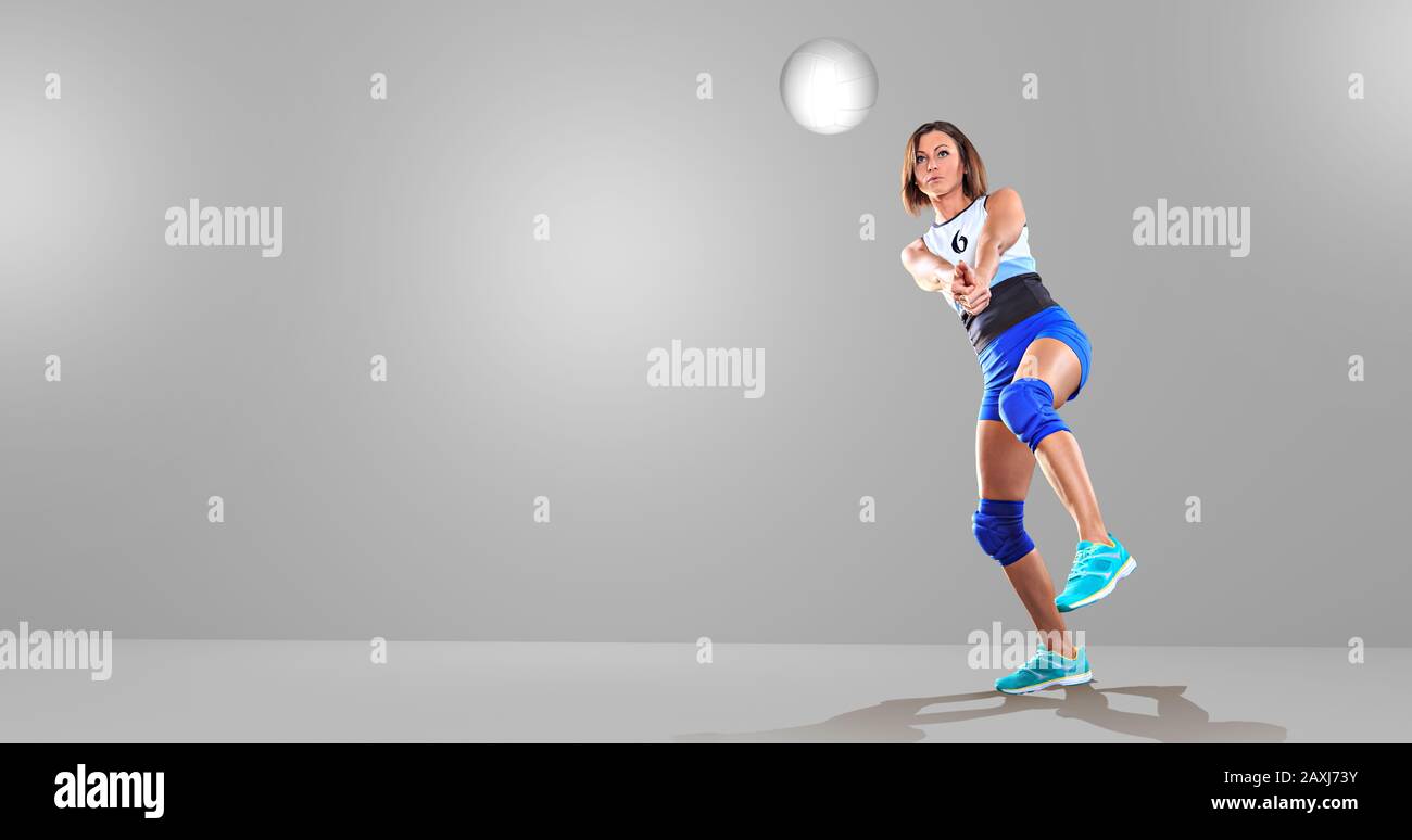 female volleyball player with a ball Stock Photo - Alamy