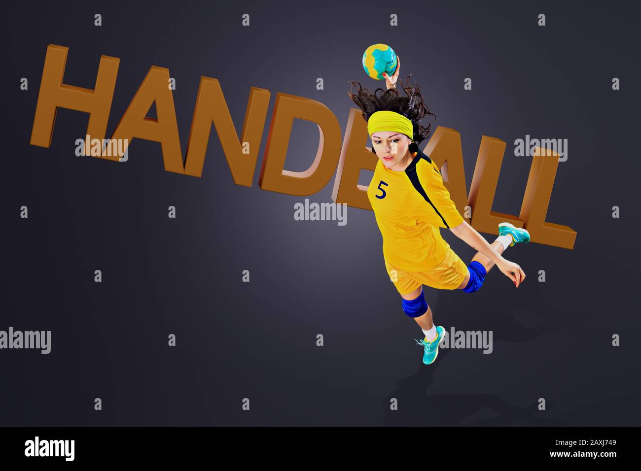 female handball player with a ball in action Stock Photo - Alamy