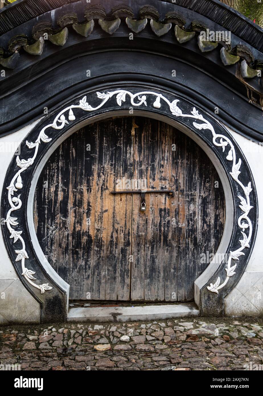 Traditional entryway into home in the historic water village of Tong-Li ...