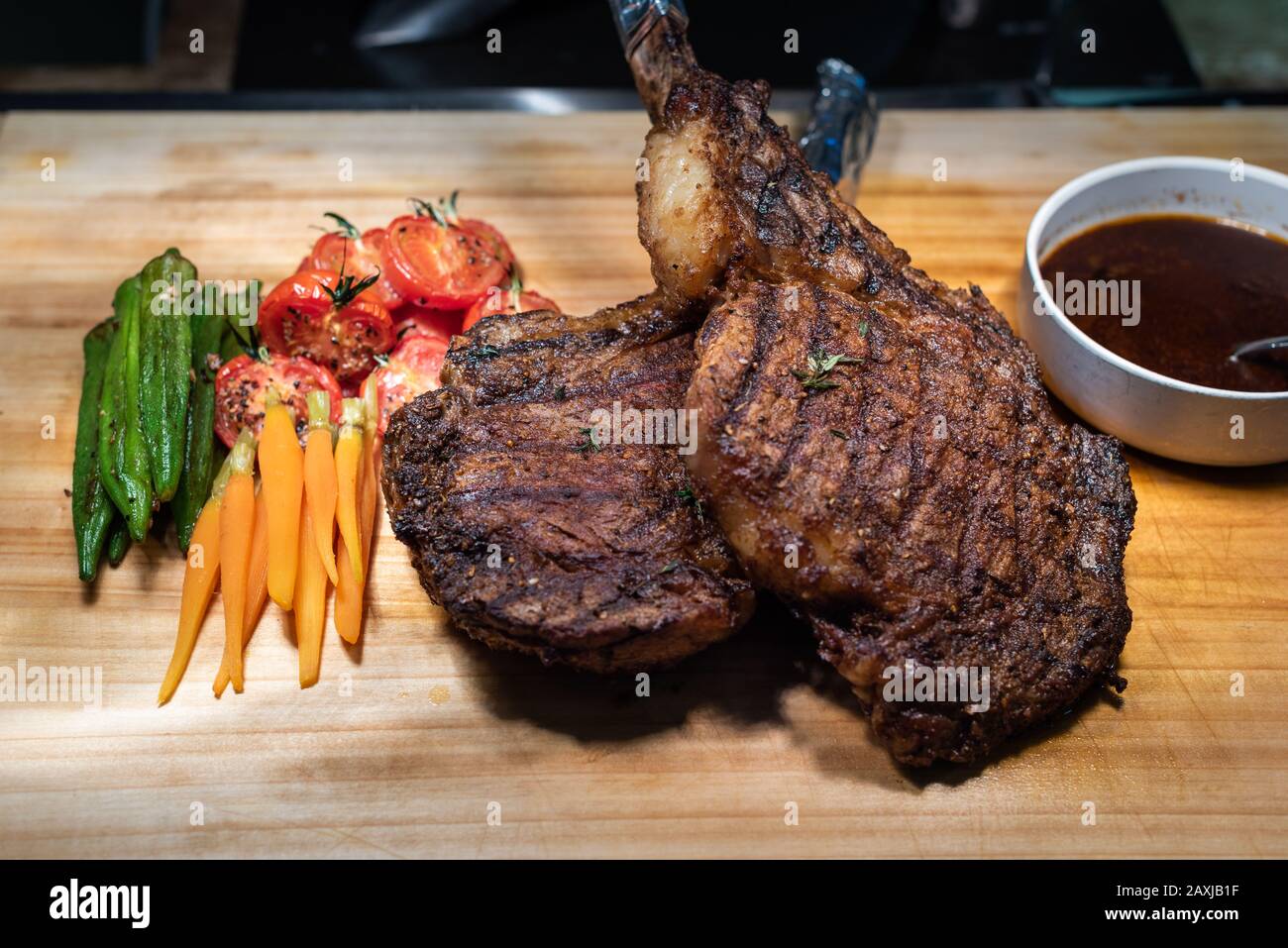Pork chop in a buffet restaurant Stock Photo - Alamy