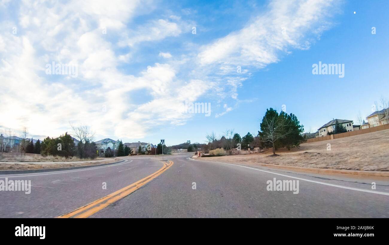 Driving through upscale residential neighborhood in suburbia Stock ...