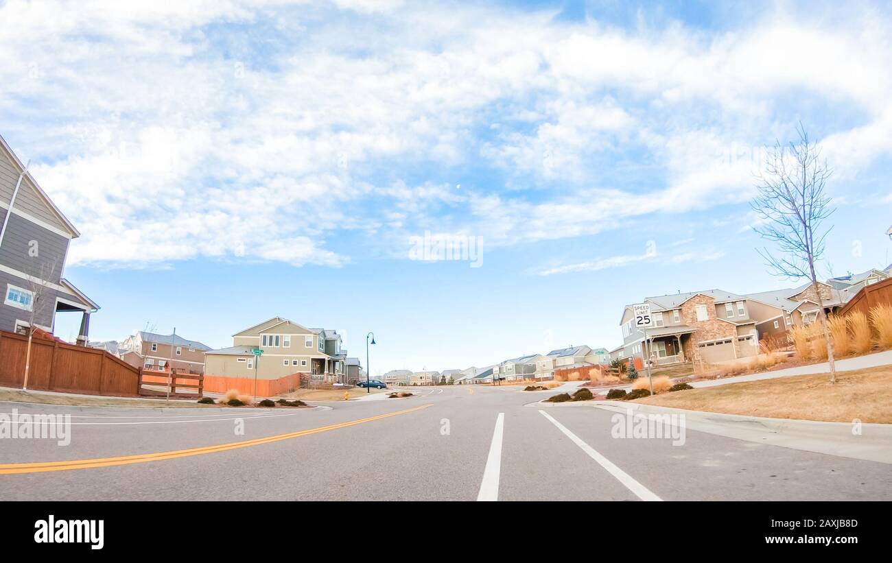 Driving through new residential neighborhood in suburbia Stock Photo ...