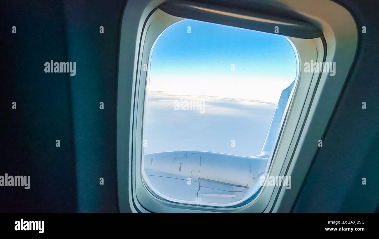 View from the window seat of commercial passenger airplane Stock Photo ...