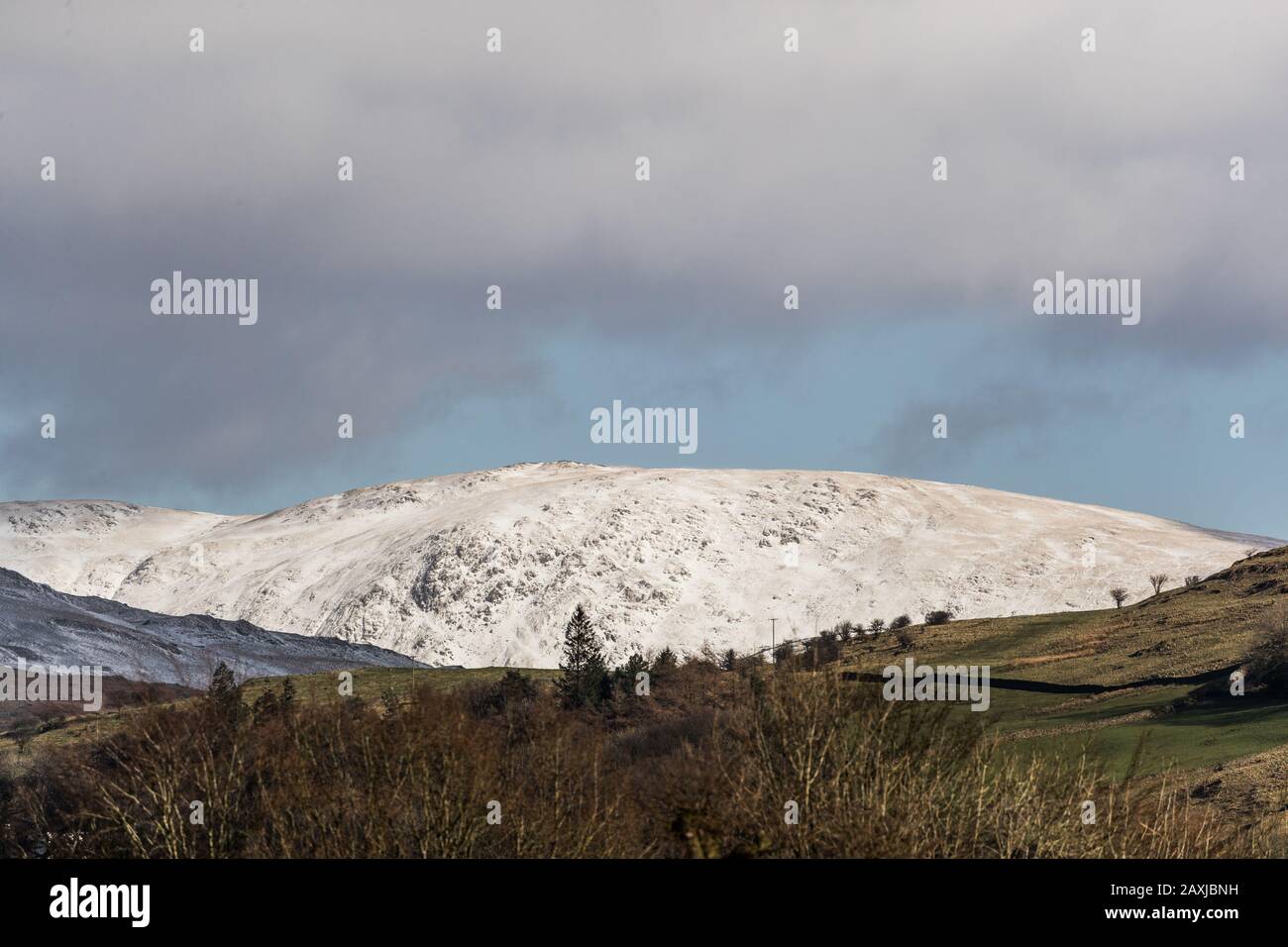 Cumbria, UK. 12th Feb, 2020. UK weather . Snow on fells above the ...