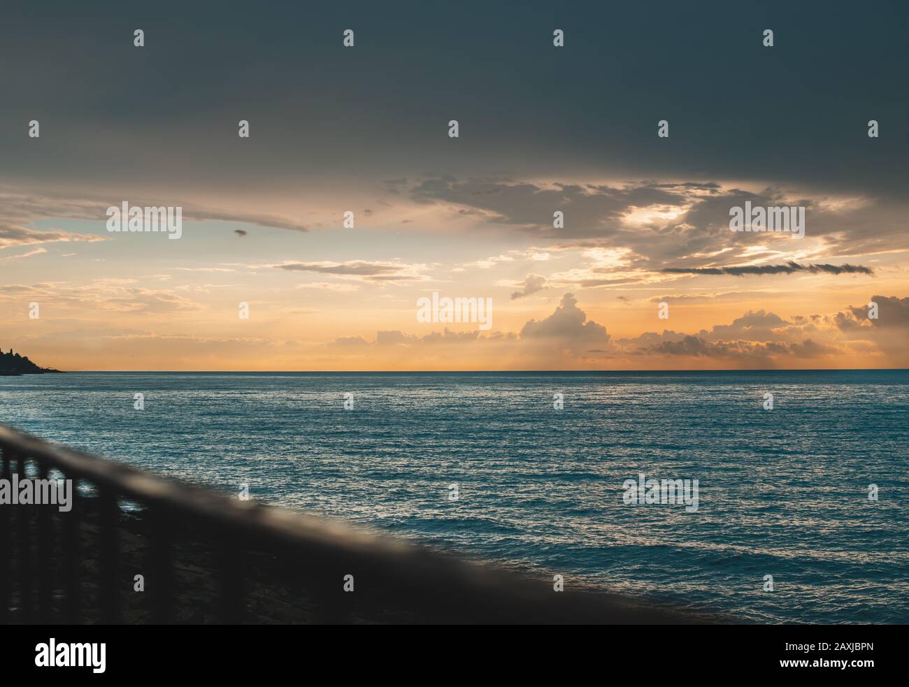 Sea horizon line and sunset photo. Landscape concept Stock Photo - Alamy