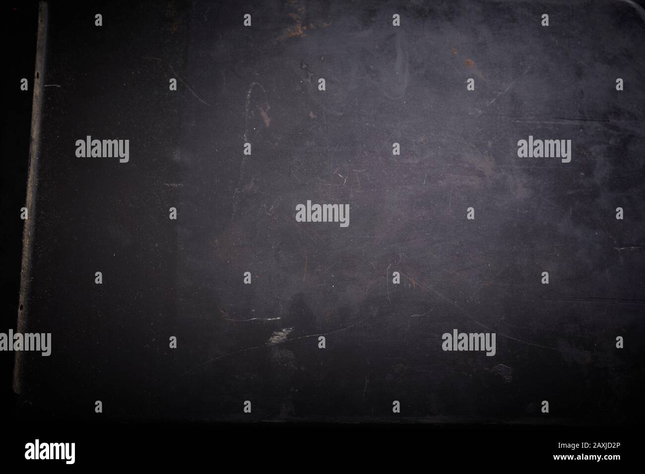 Baking tray or oven pan dark grey texture with small scratches top view ...