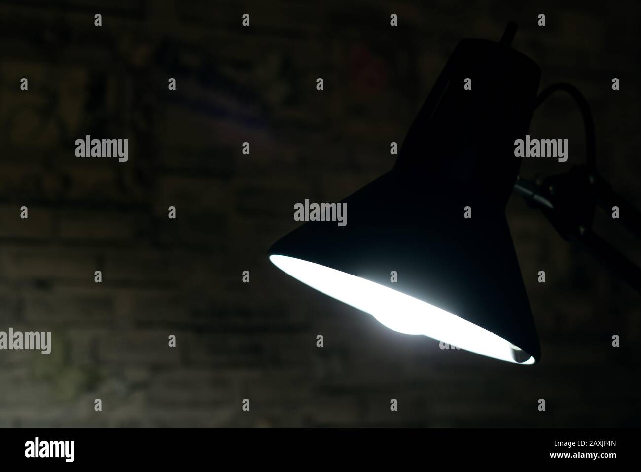 Light of black table lamp in dark Stock Photo - Alamy