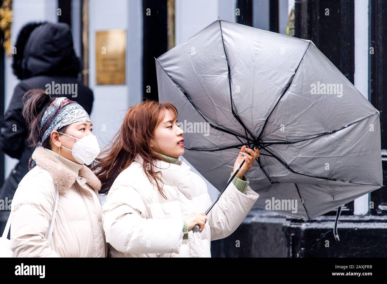 Windy umbrella scotland hi-res stock photography and images - Alamy
