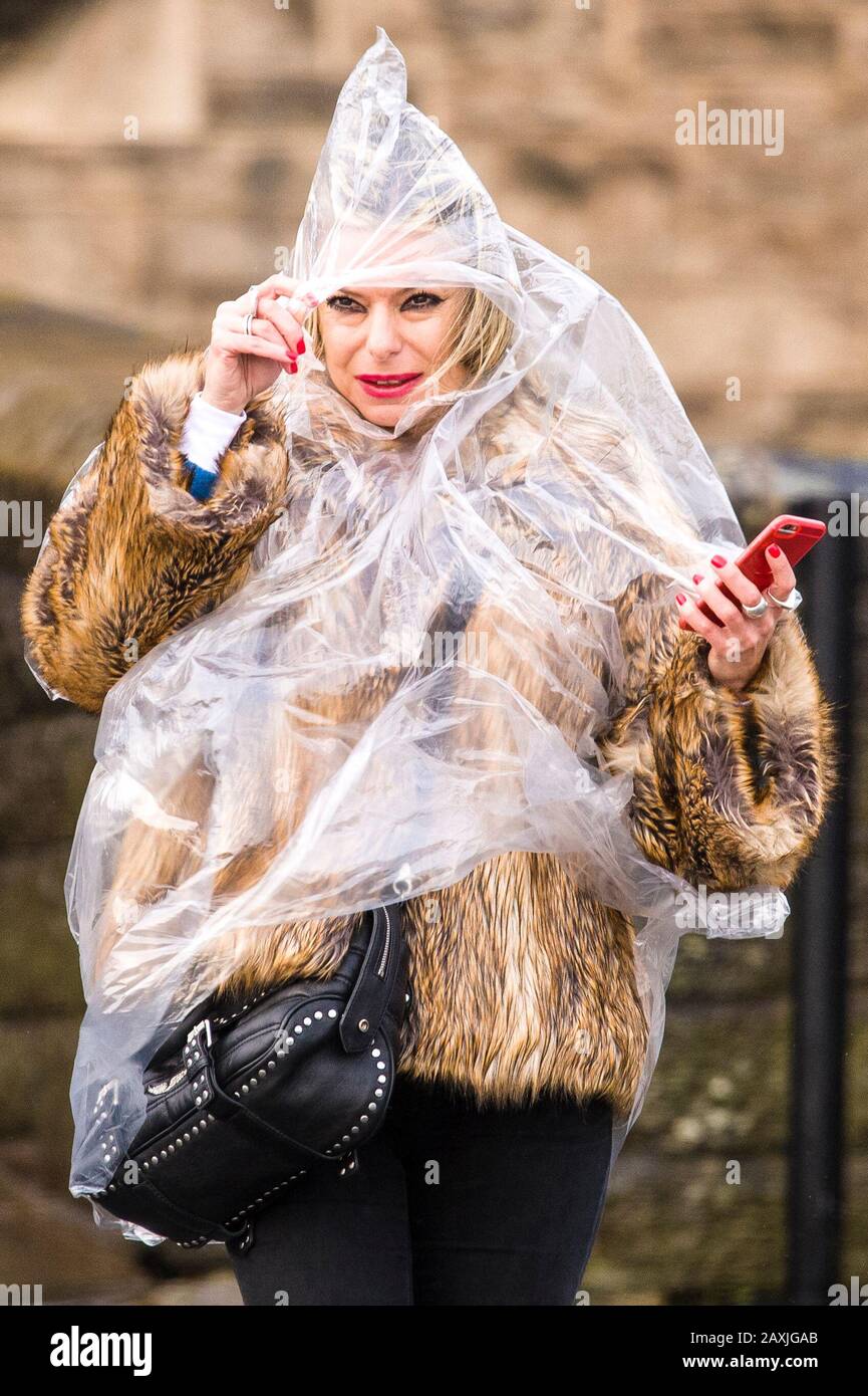 Edinburgh embraces strong winds and rain which see's Edinburgh castle ...
