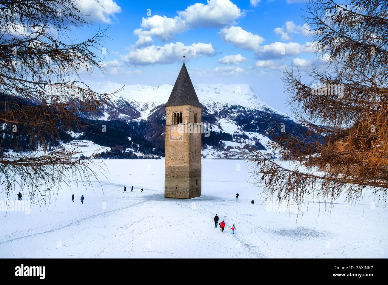 Winter landscape in the Alps with the famous sunken church tower in ...