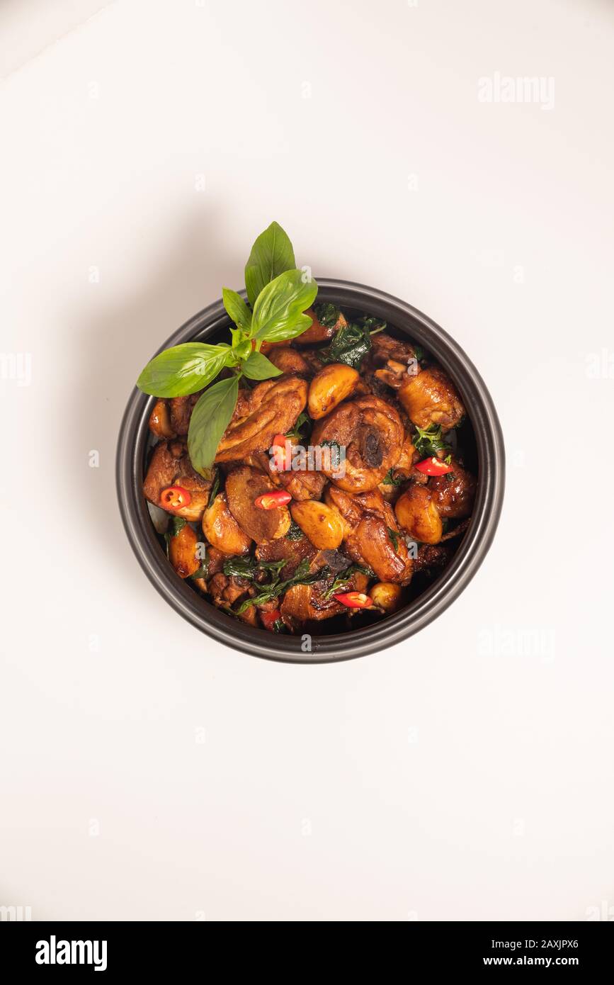 Delicious traditional Chinese three cups chicken dish on white ...