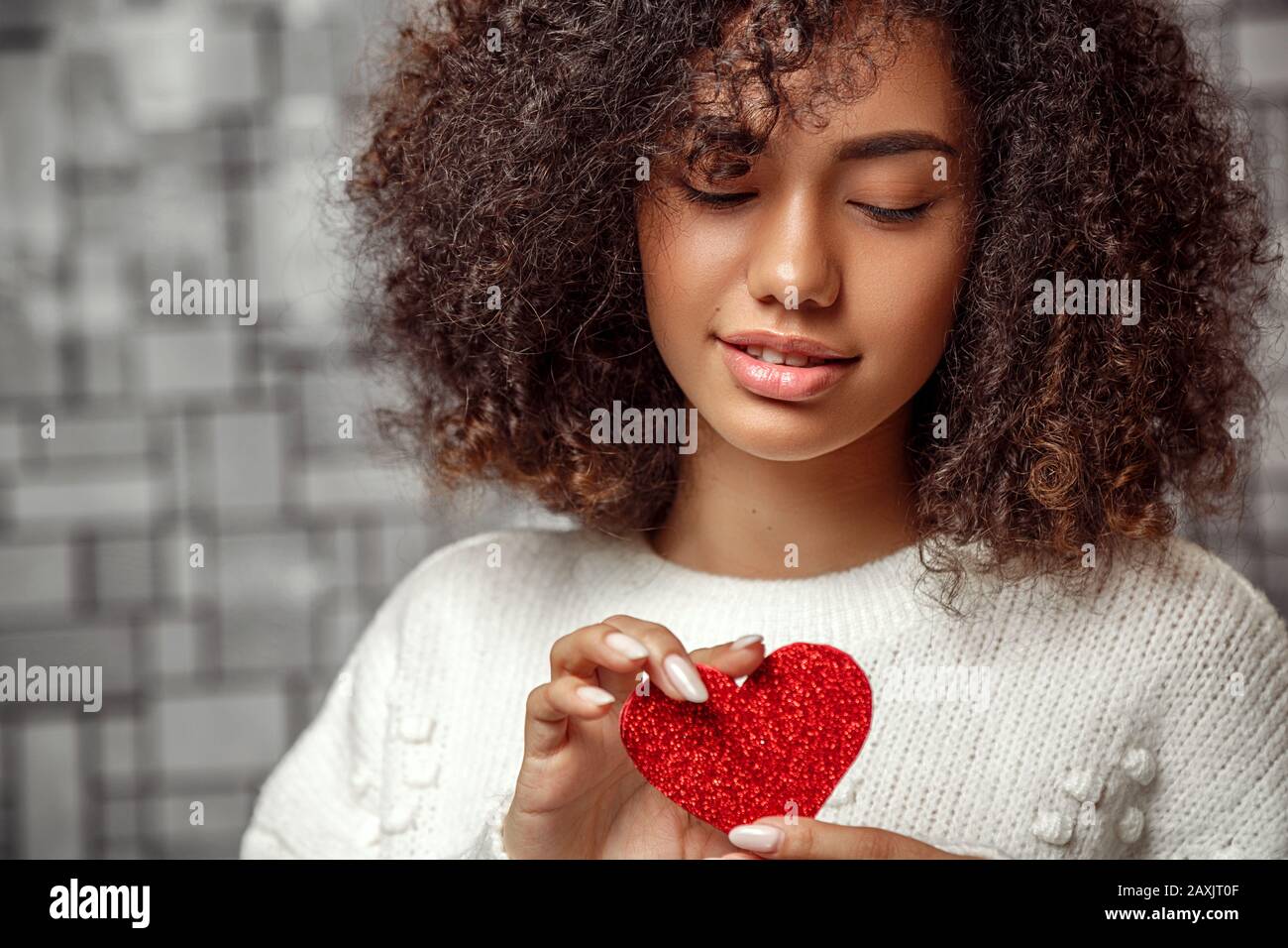 Close Up Portrait Of A Young Curly Haired African American Girl In A