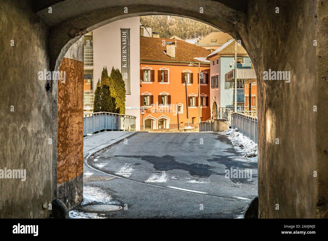 Brunico (BZ), February 12, 2019: sunlight is enlightening the street of ... Brunico (BZ), February 12, 2019: sunlight is enlightening the street of ...