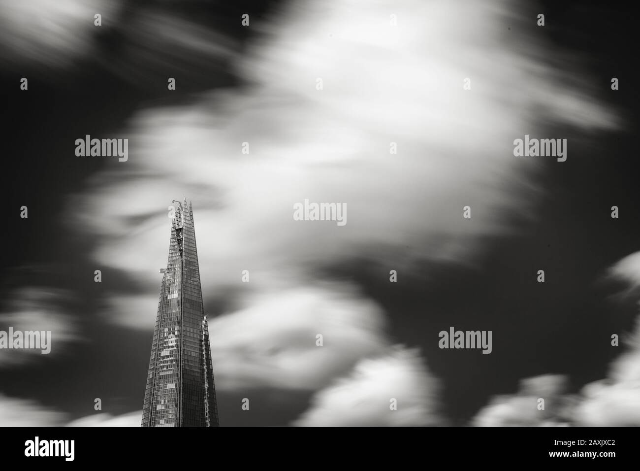 Top of the The Shard in Black and White with moving clouds. London ...