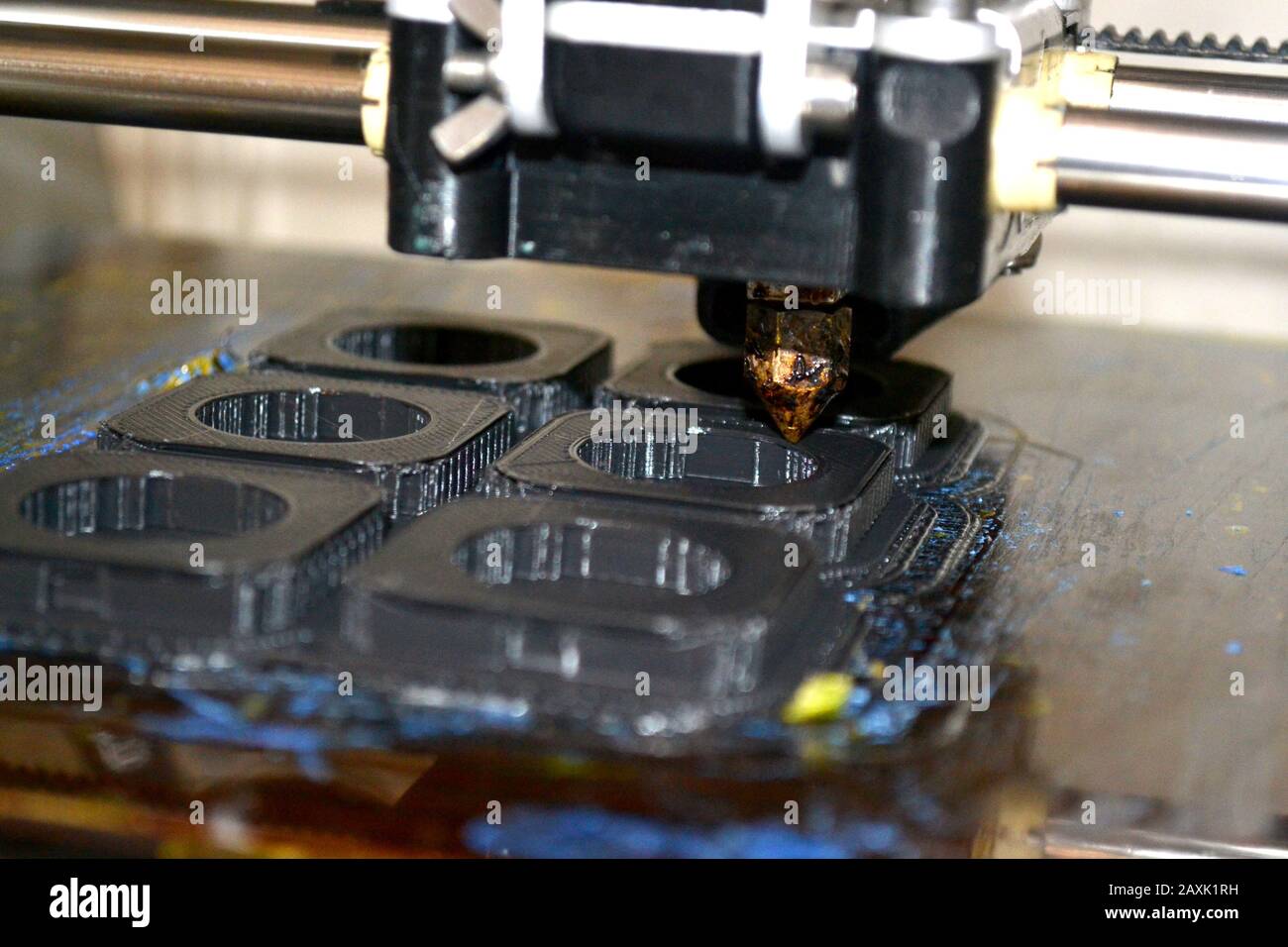 Modern 3D printer printing figure close-up macro. Automatic three ...