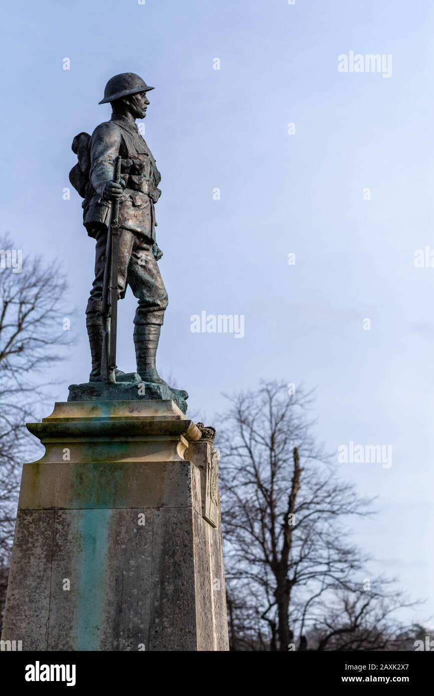 Bronze statue of a WW1 soldier stood outside Winchester Cathedral ...