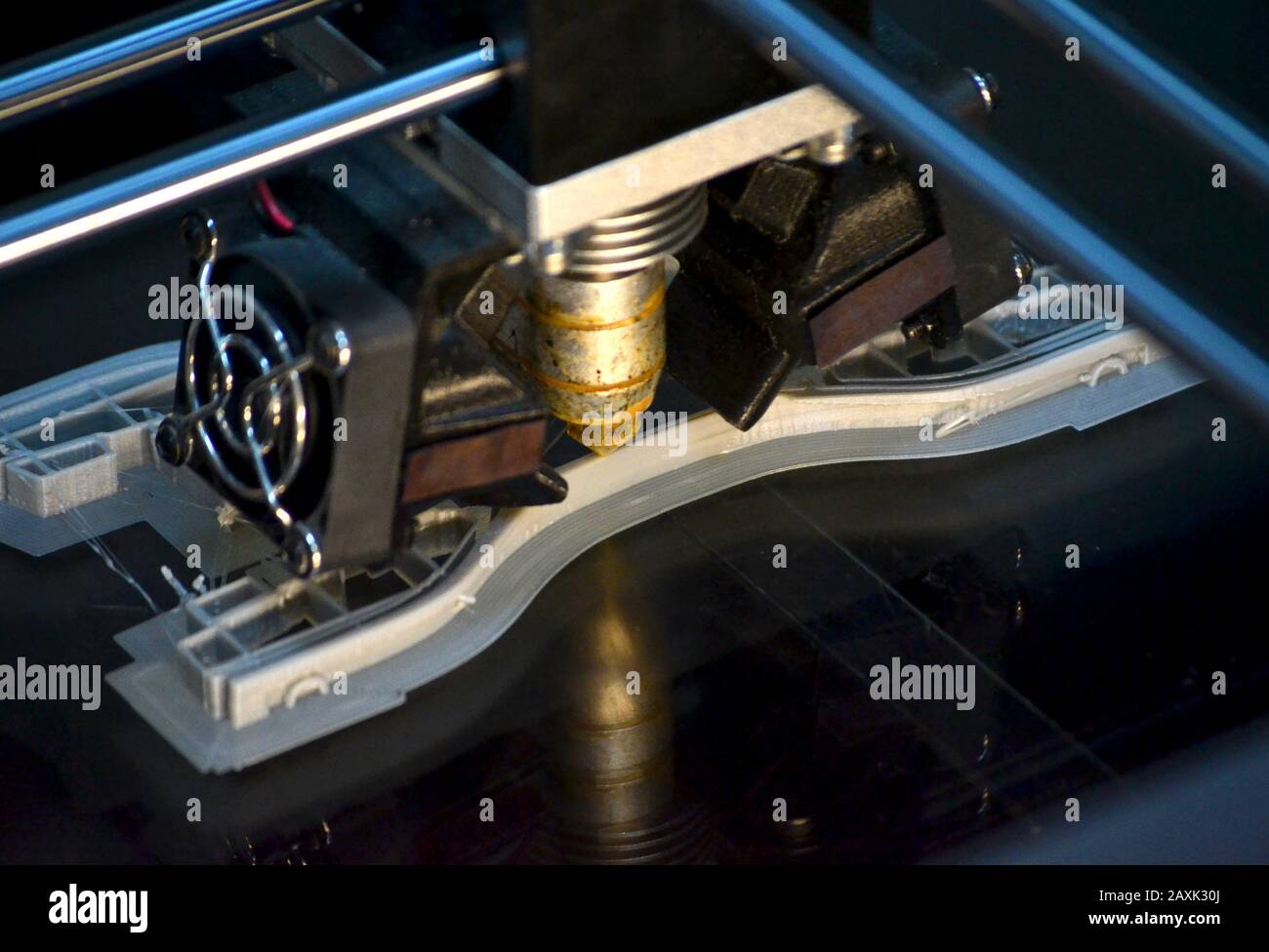 3D printer print isolated objects on mirror reflective surface close-up ...