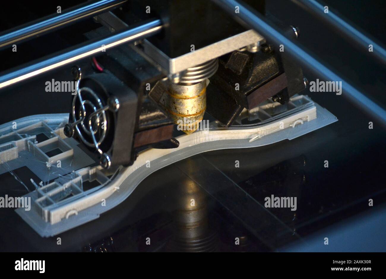 3D printer print isolated objects on mirror reflective surface close-up ...