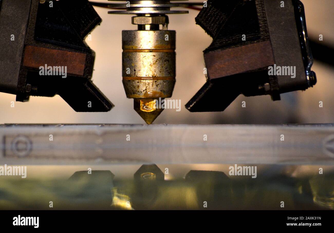 3D printer print isolated objects on mirror reflective surface close-up ...
