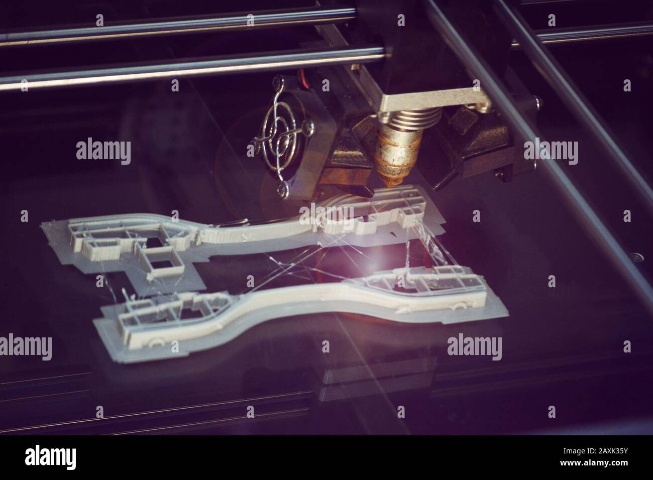 3D printer print isolated objects on mirror reflective surface close-up ...