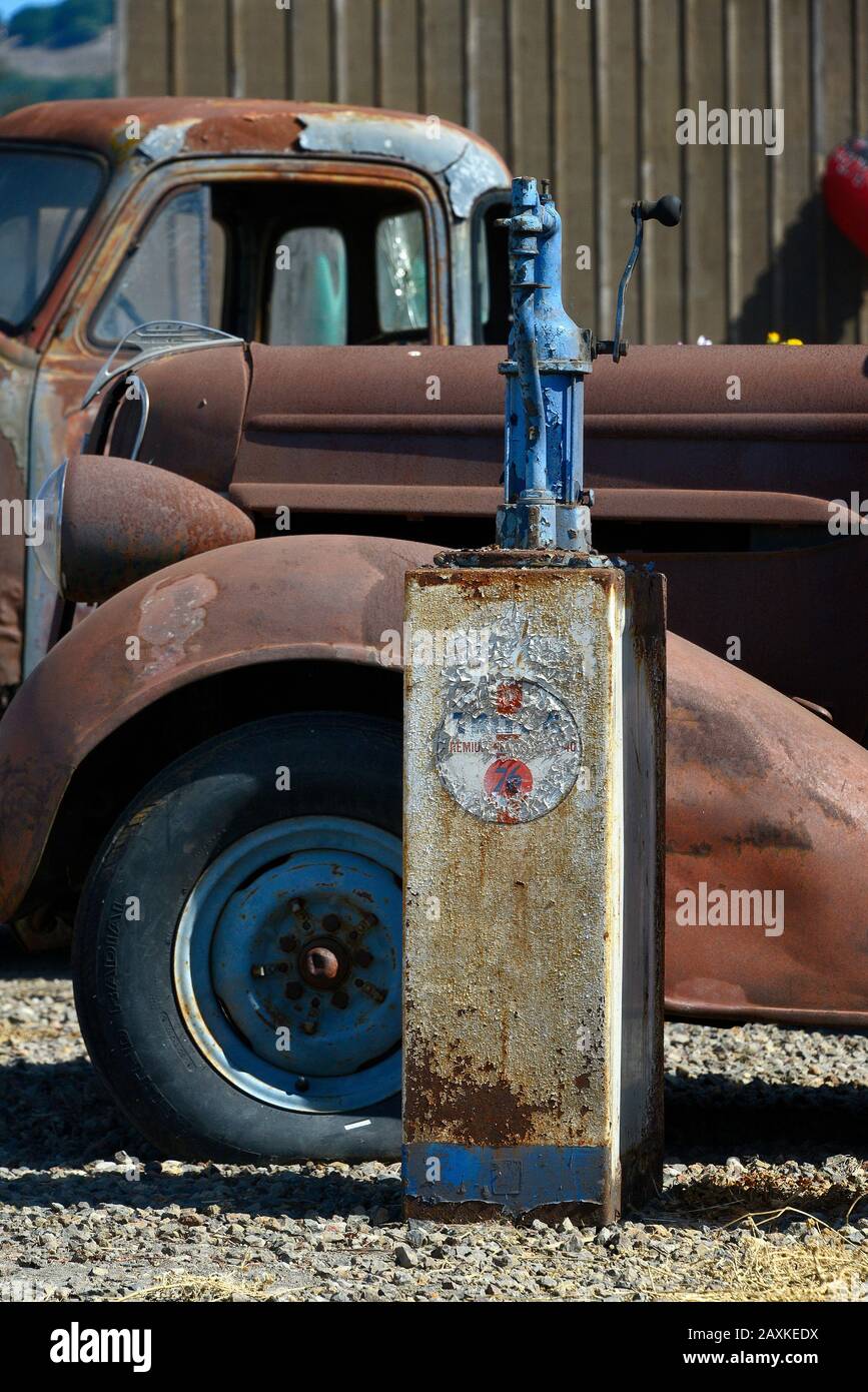 Old, rusted cars and pump on a farm in Sonoma County, California, USA ...