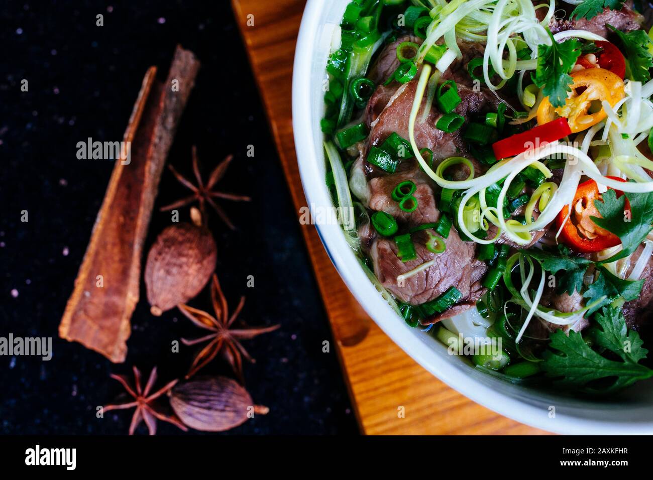 High angle close up of a bowl of beef pho Stock Photo - Alamy