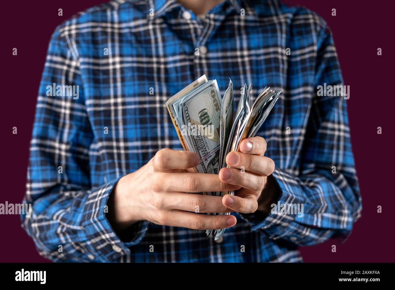 the person's hand giving you the bunch pack of cash money Stock Photo ...