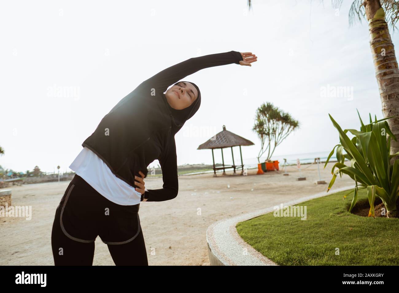 muslim female workout before fitness training session outdoor. Healthy ...