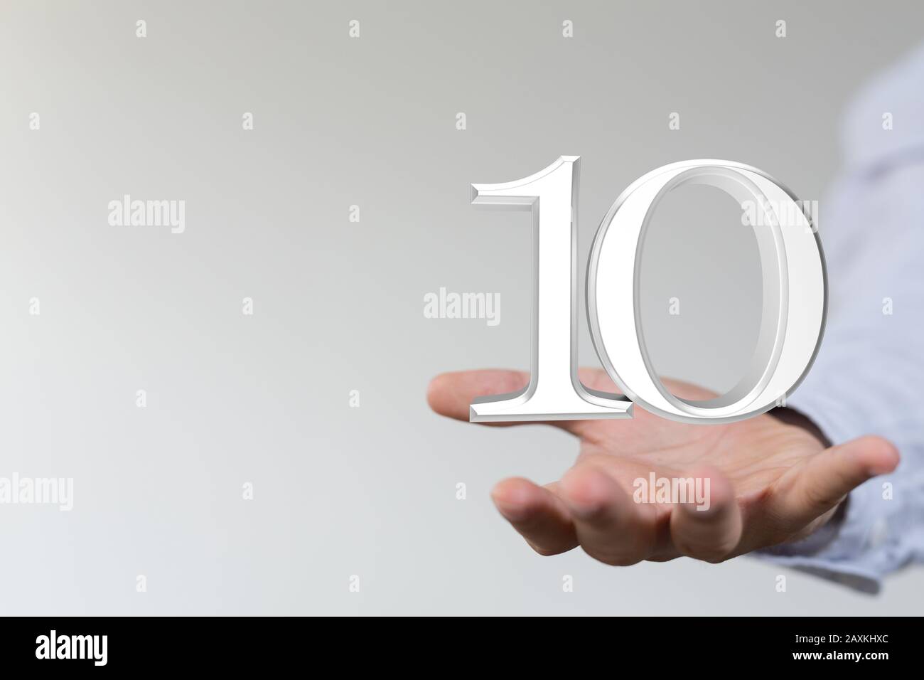 Person presenting a visual projection of digital number ten at a ...