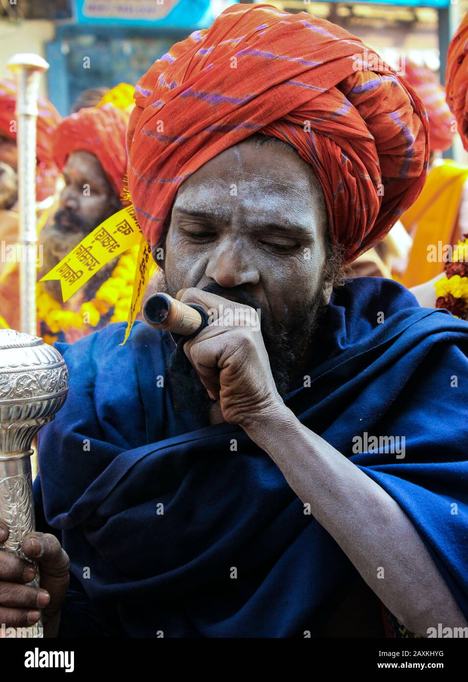 sadhu having chillam Stock Photo - Alamy