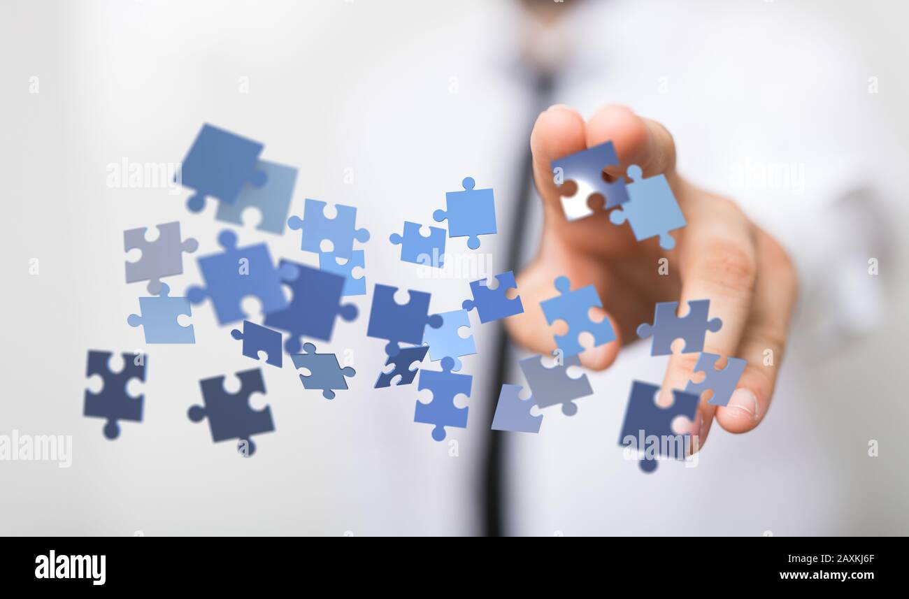 Person presenting a virtual projection of puzzles - business solution ...