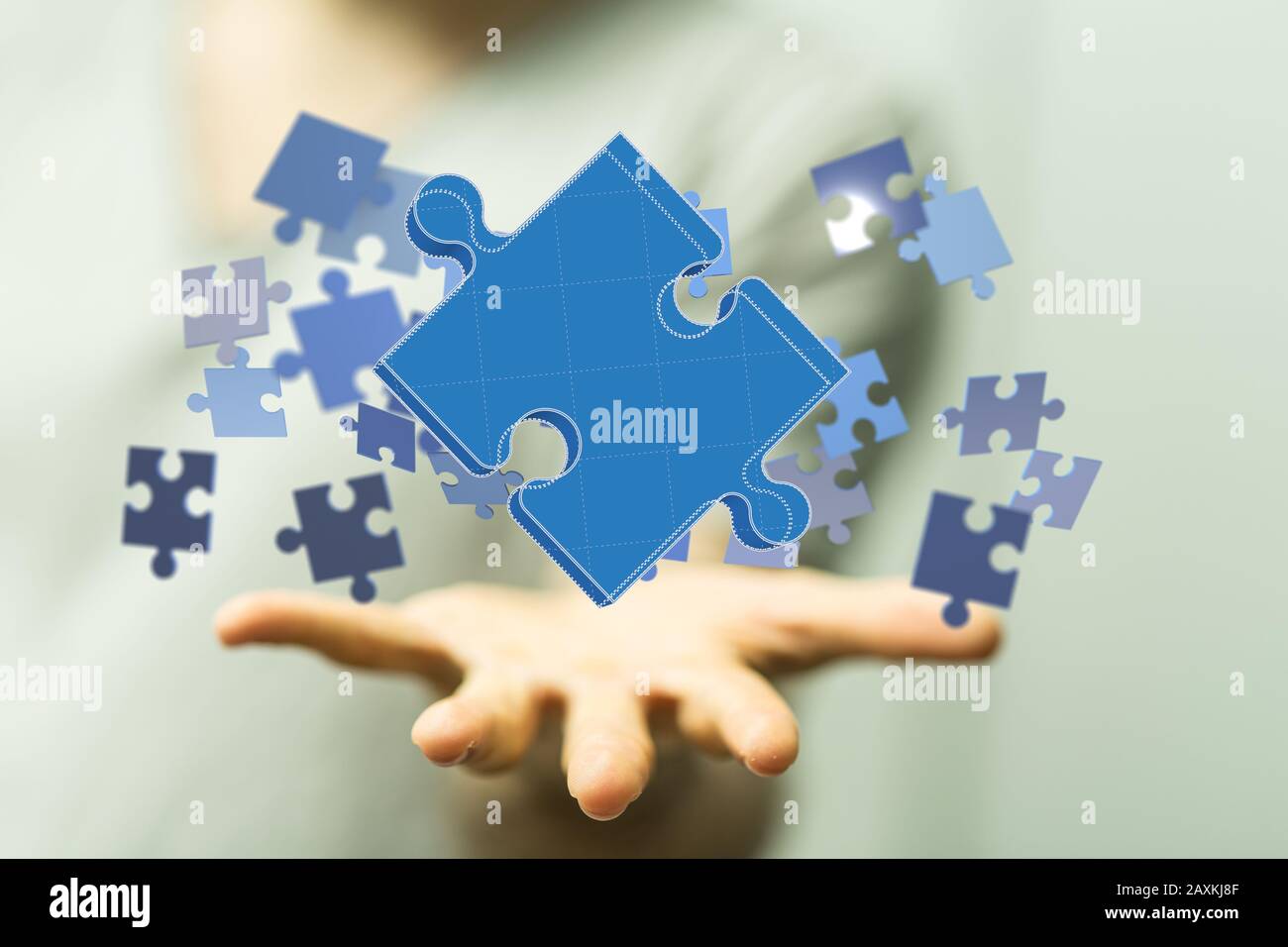 Person presenting a virtual projection of puzzles - business solution ...