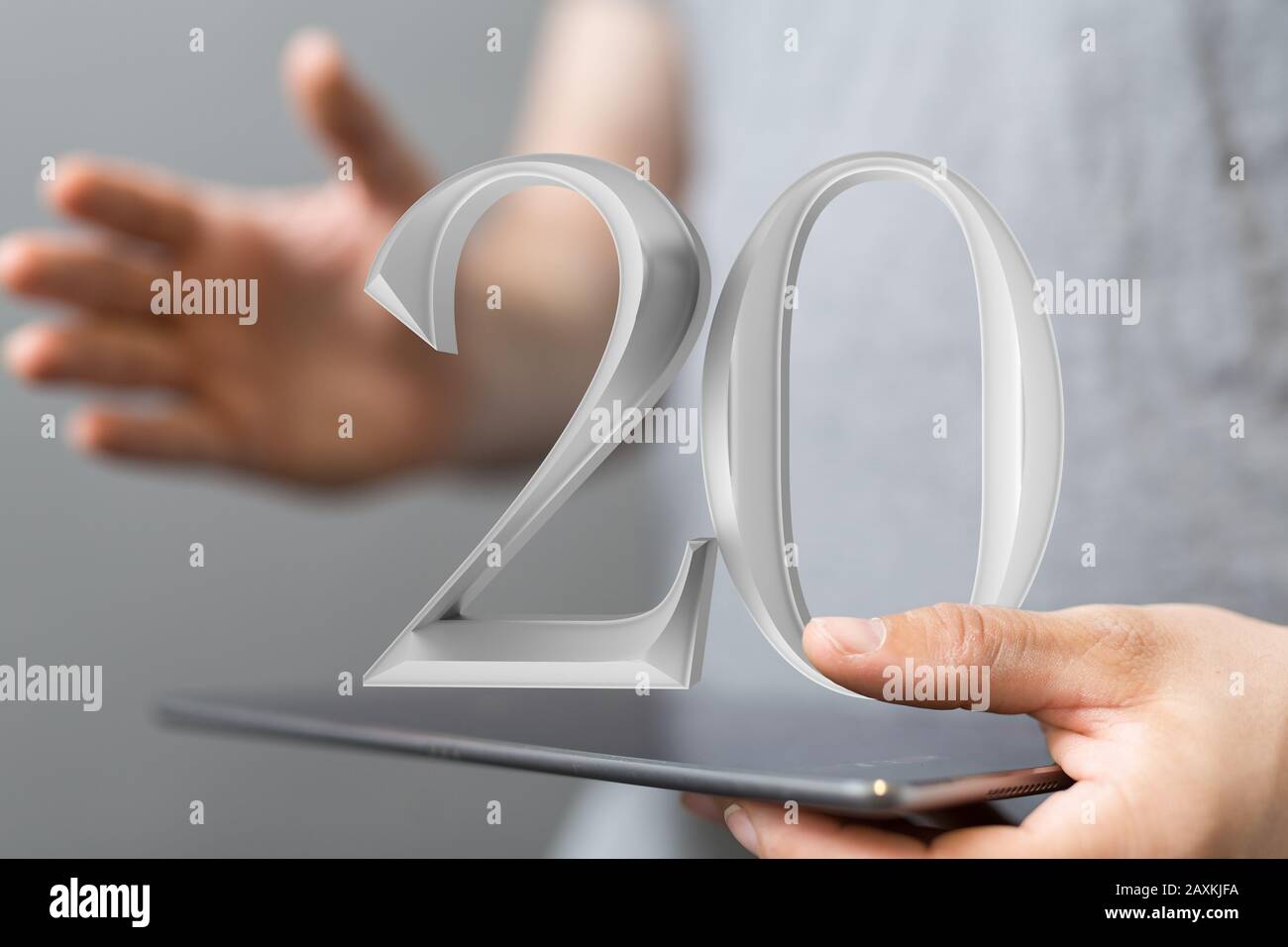 Person presenting a visual projection of a digital number twenty at a ...
