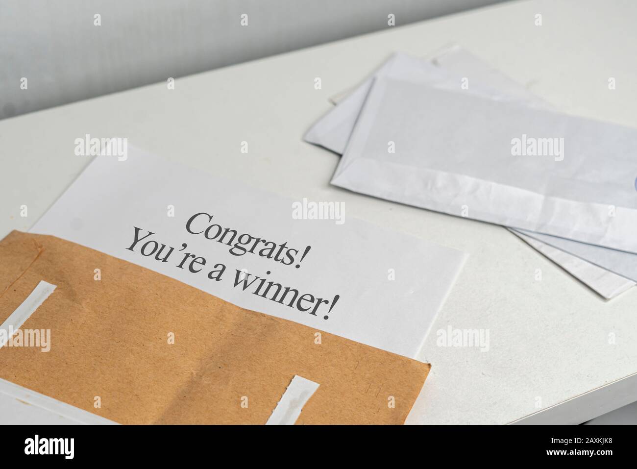 Prize envelope hi-res stock photography and images - Alamy