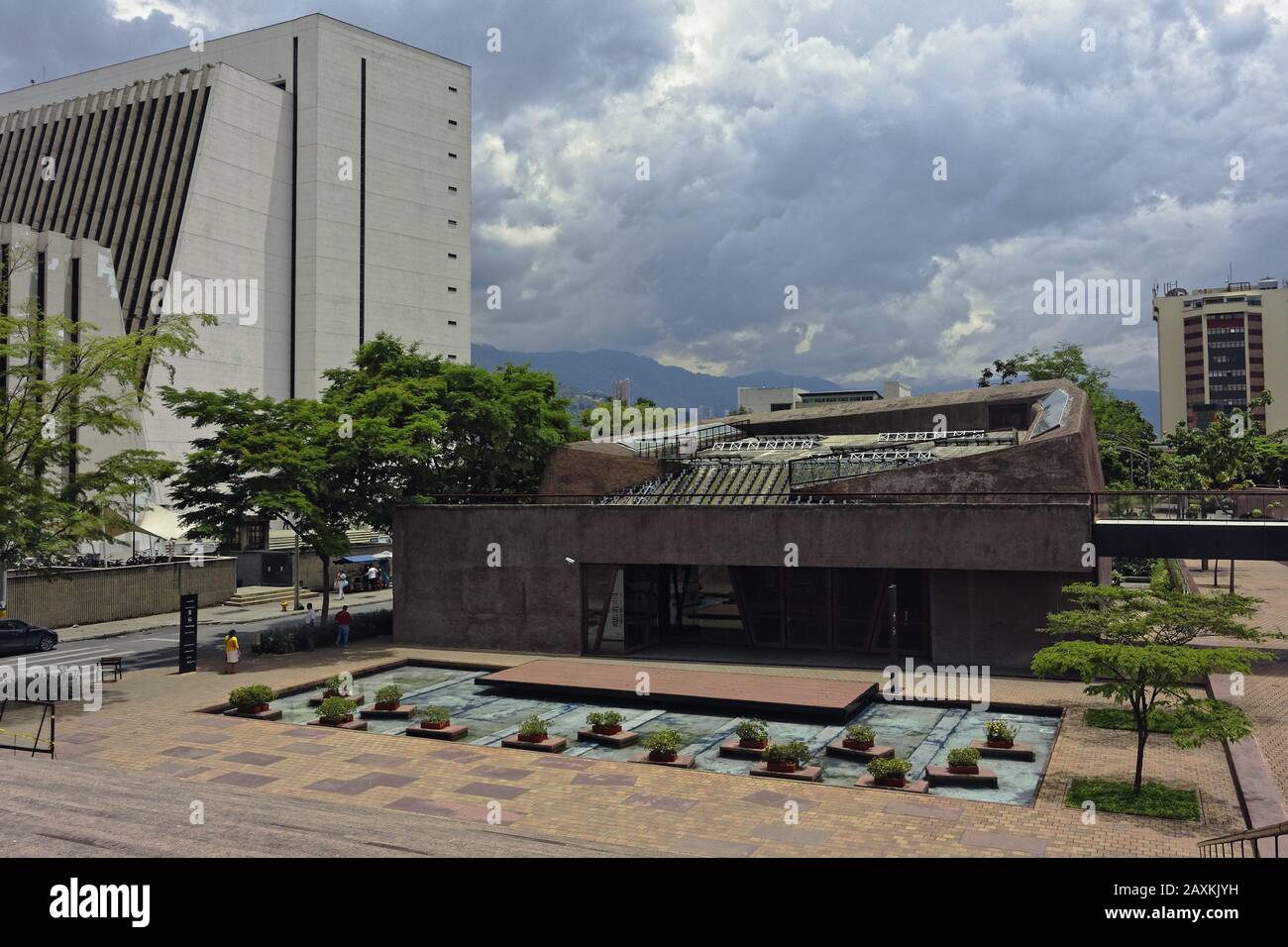 Wide angle shot of a building surrounded by trees during daytime Stock ...