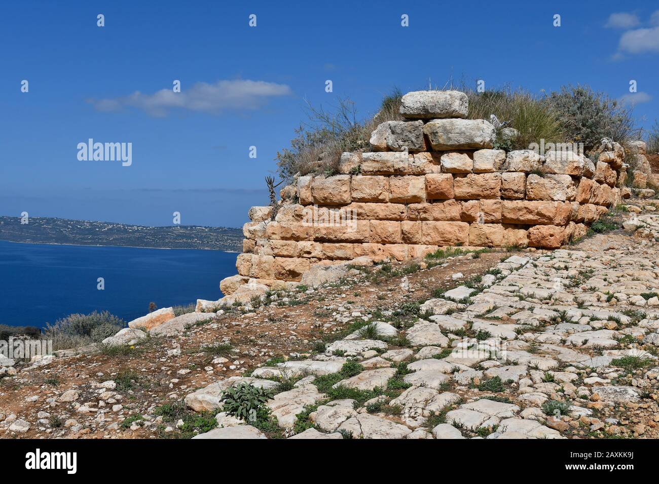 Greece, cobbled street on ancient Minoan ruins of Aptera Stock Photo ...