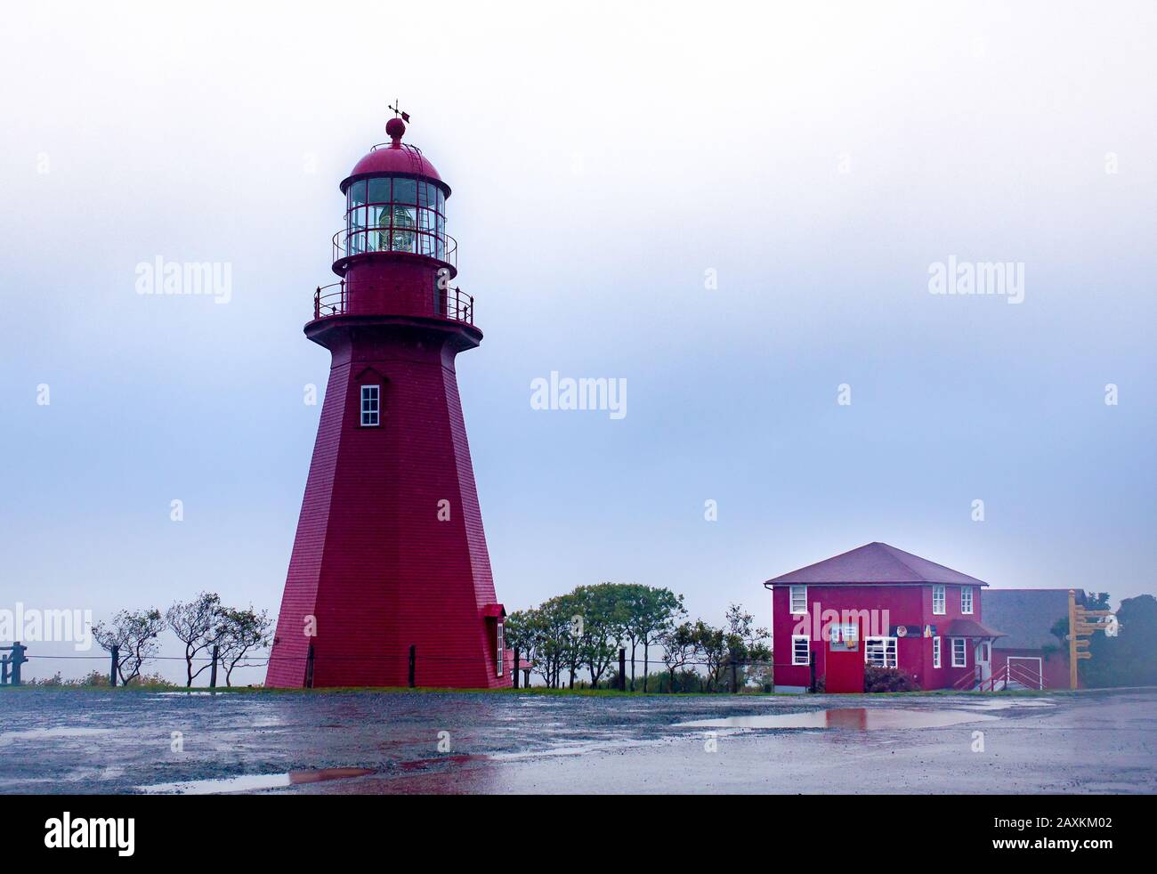 Bottom view shot of the La Martre Red Lighthouse in Canada Stock Photo ...