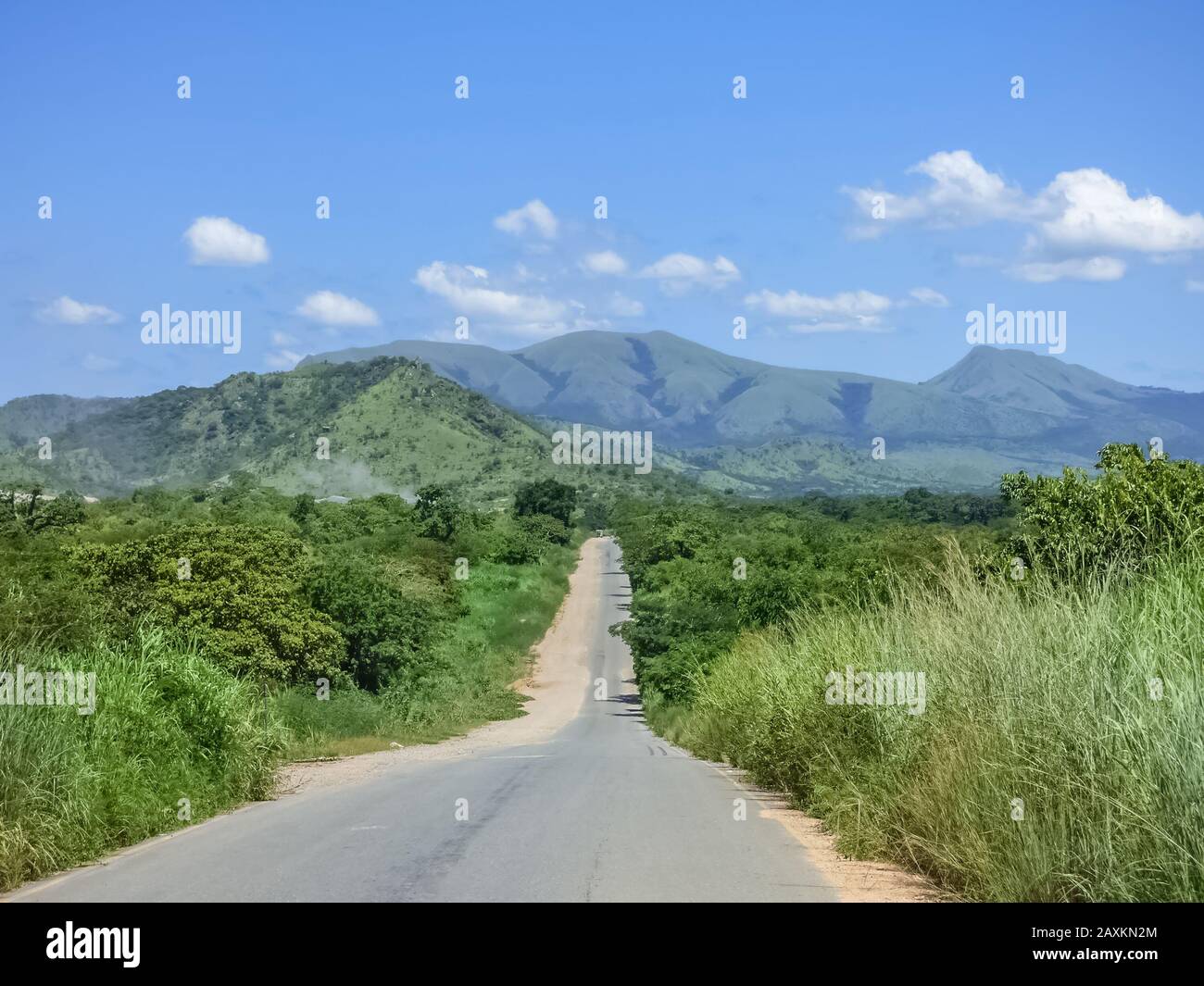 Road view with tropical landscape around, typical tropical African ...