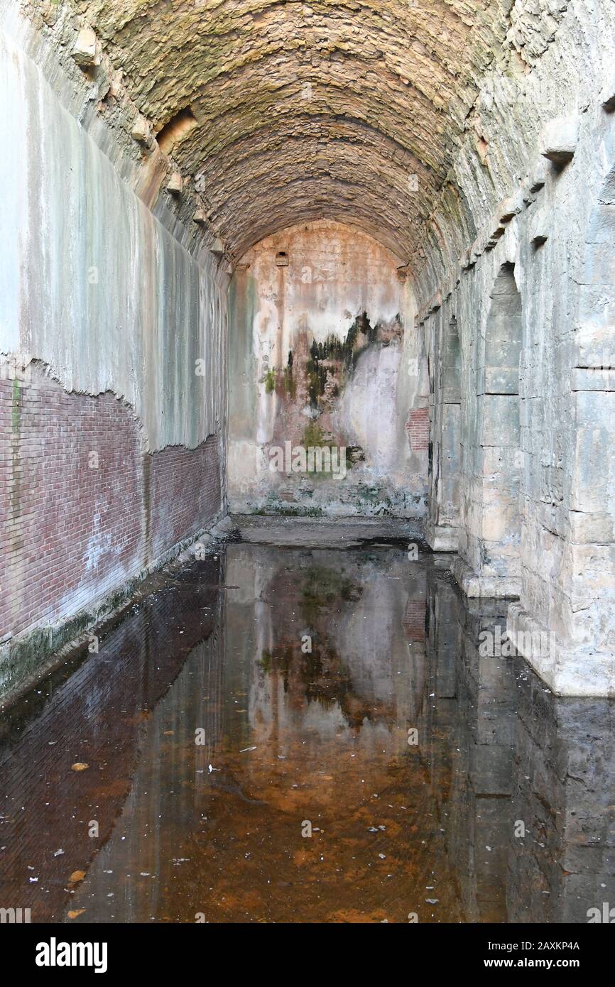 Greece, ancient Roman cistern at archaelogical site of Minoan ruins of ...