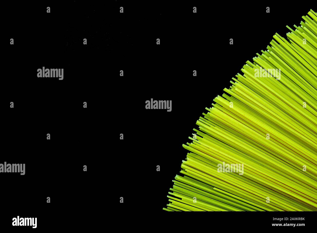 Bright spaghetti strands with a completely black background Stock Photo ...