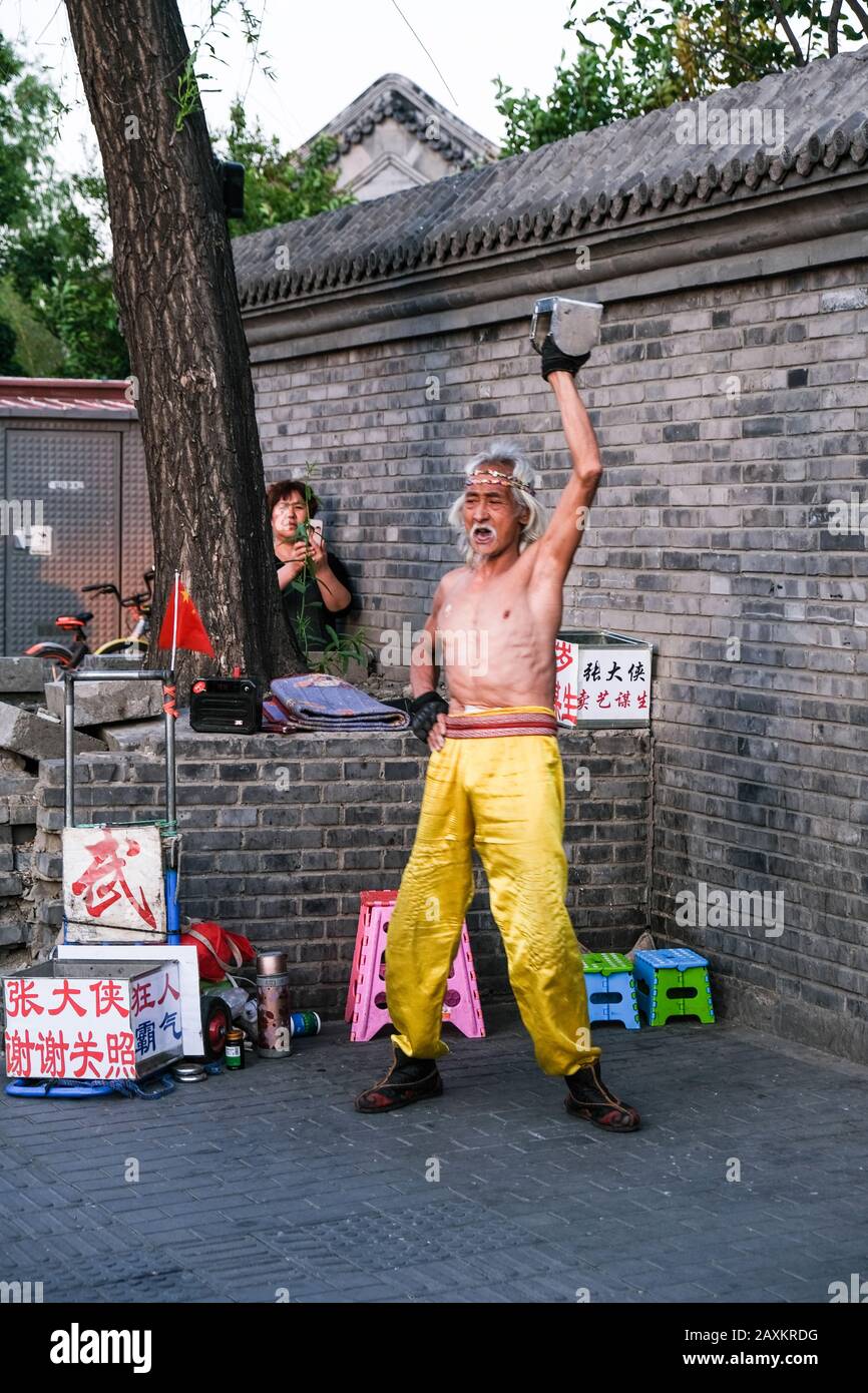BEIJING, CHINA - May 01, 2019: An old Chinese master performs Kongfu ...