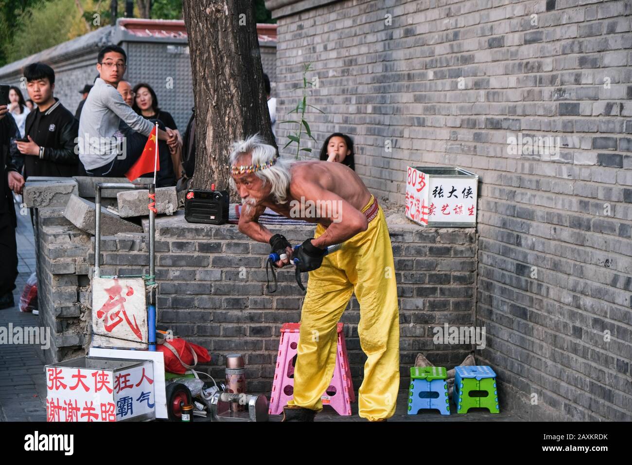 BEIJING, CHINA - May 01, 2019: An old Chinese master performs Kongfu ...
